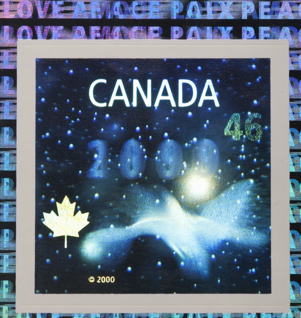 2000 OFFICIAL MILLENNIUM KEEPSAKE TIN, Includes Stamps by Canada Post ...